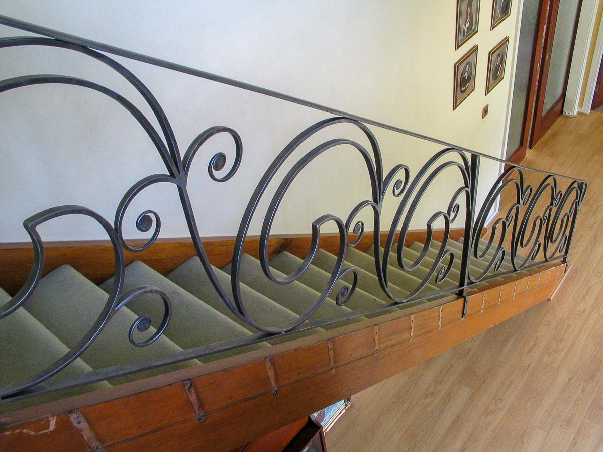 Elegant Flowing Wrought Iron Bannister